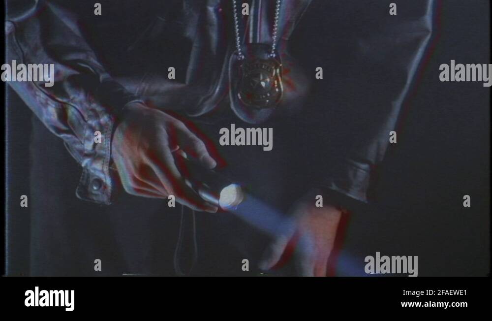 Police Officer With a Flash Light VHS Retro 80s 90s Look Stock Video ...