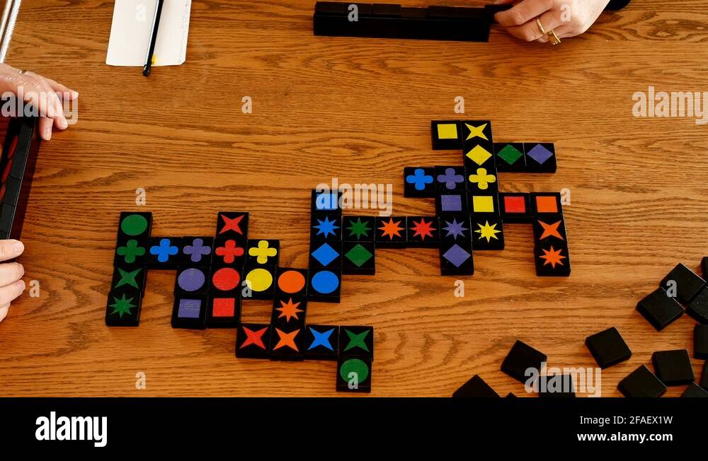 Colors and shapes on tiles placed in rows are played in this fun table ...