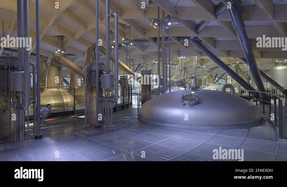 Interior pipework, copper stills and mash tuns highlighting the Stock ...
