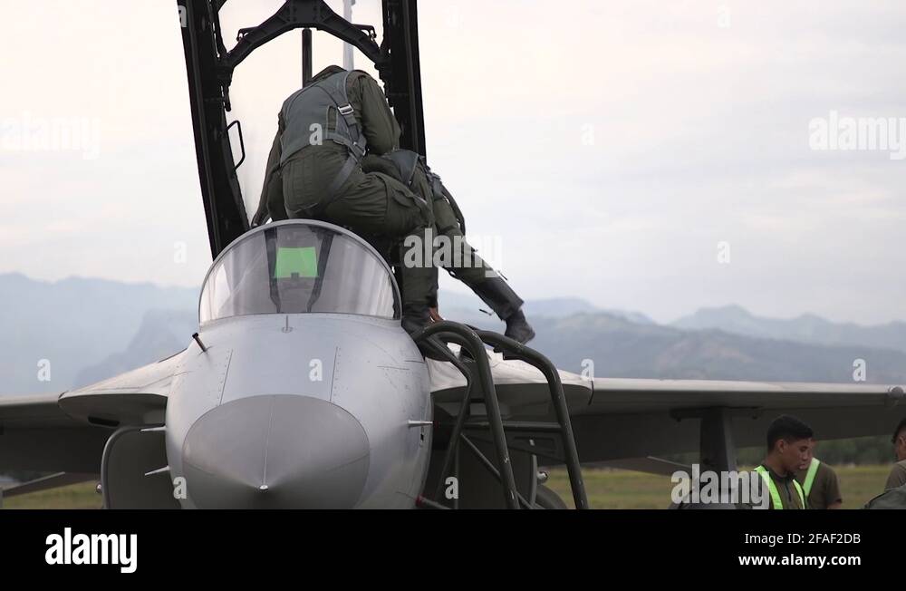 Pilots descend cockpit ladder of Philippine Air Force FA-50 fighter ...