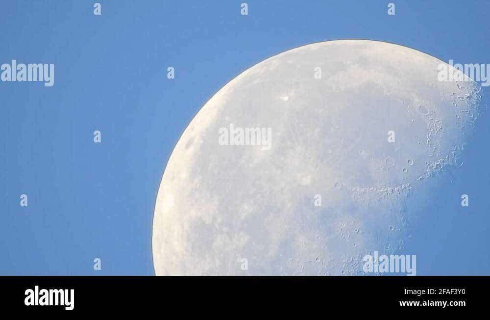 Video of the Mooning across the daytime sky. This is 4 of 5 clips, that ...