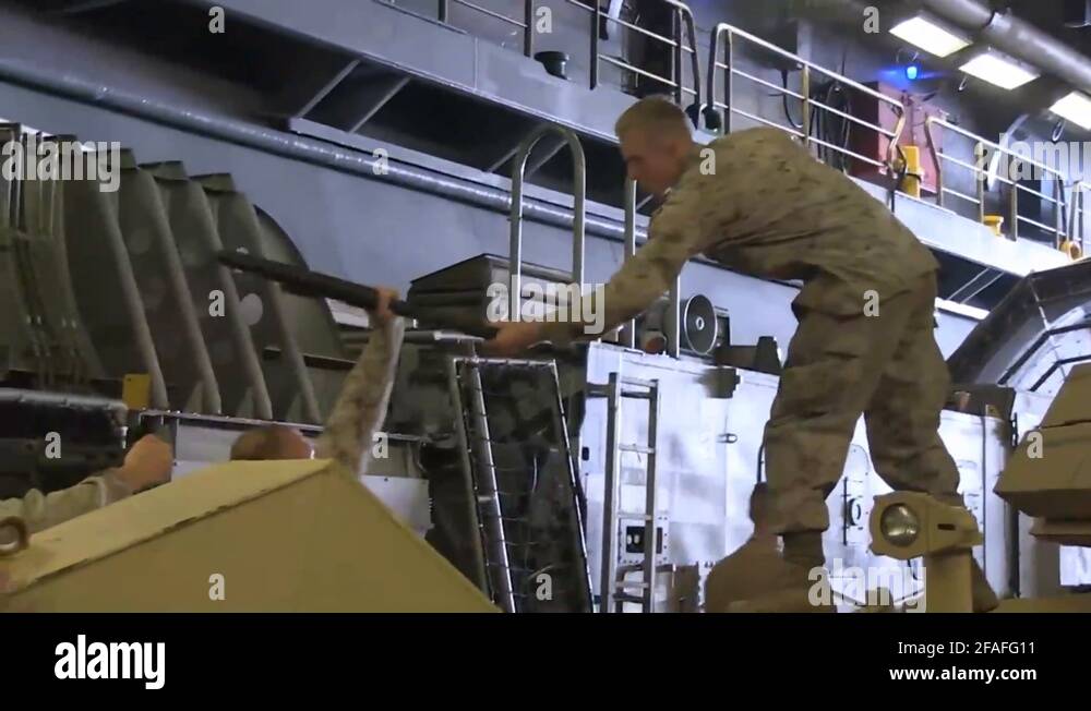 Soldiers load and assemble machine gun on a tank - 2013 Stock Video ...