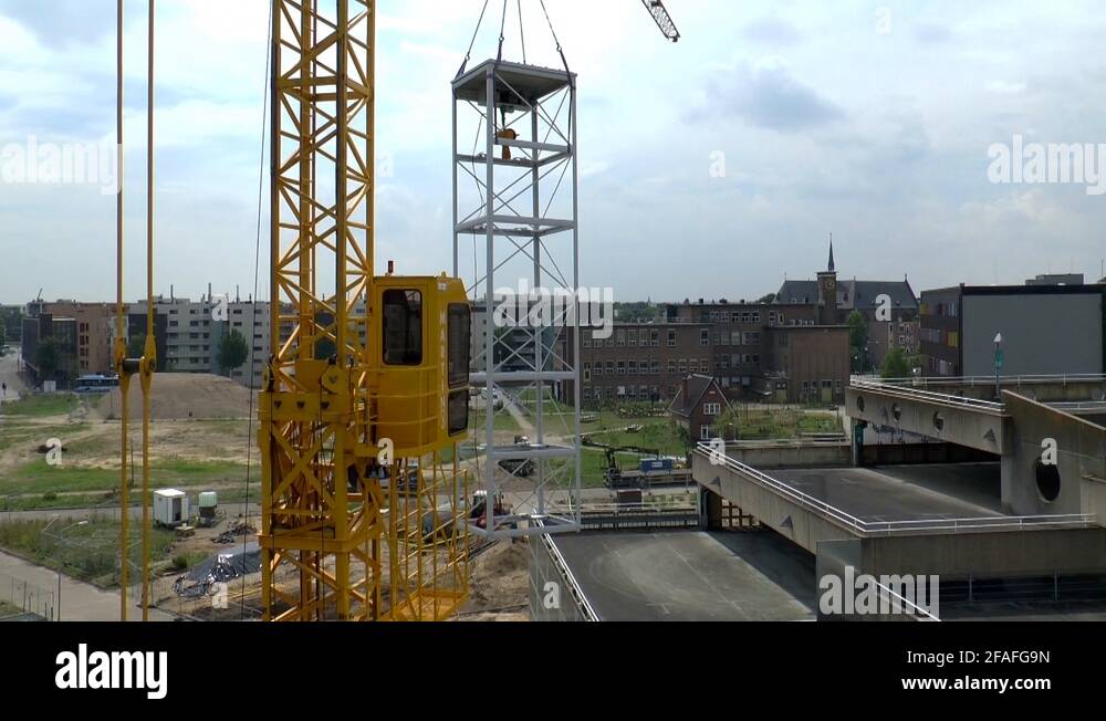 Mobile Crane Lifting Elevator Shaft Over High Building Stock Video ...