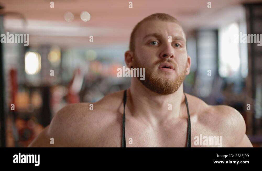 Close-up portrait of bodybuilder in the gym breathing deeply Stock ...