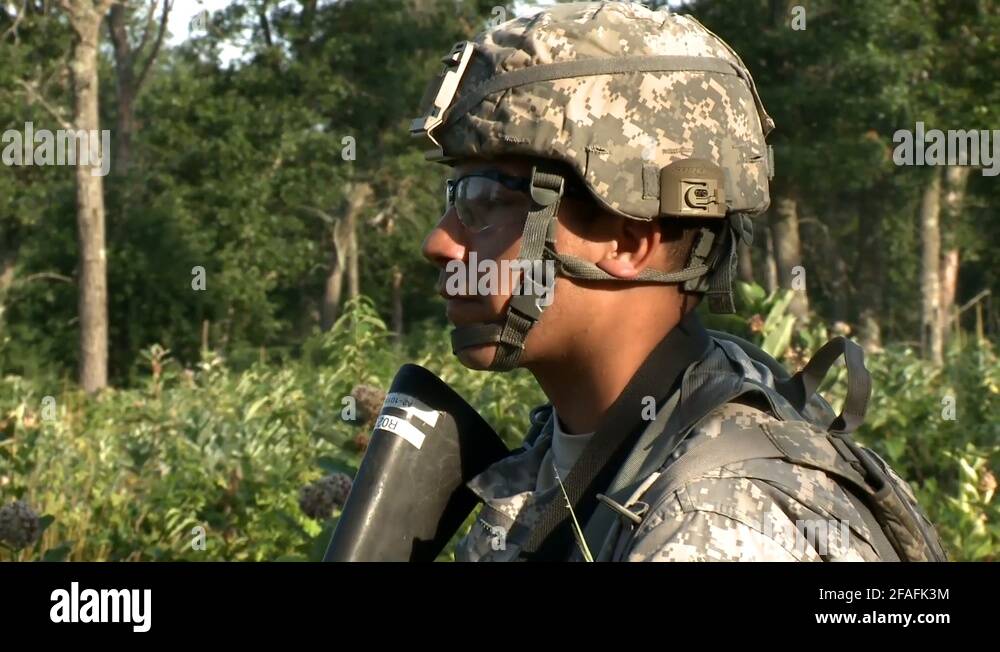 Soldiers move through forest for presence patrols and clearing a ...