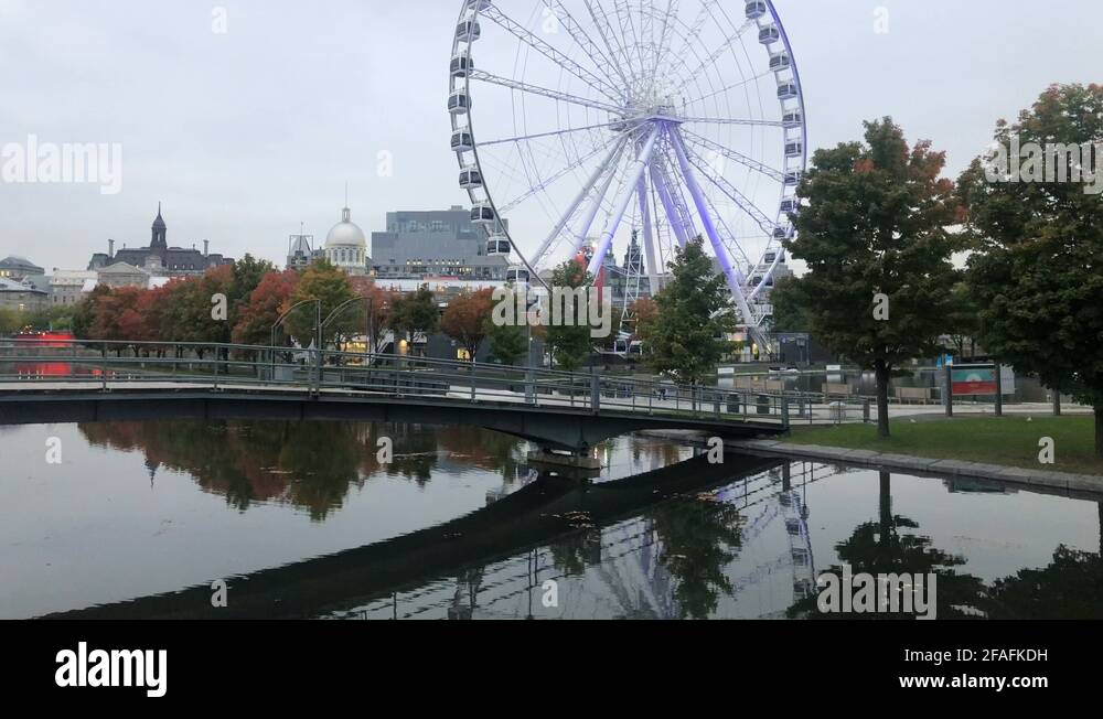 Twilight view of the La Grande Roue de Montreal observation wheel Stock ...