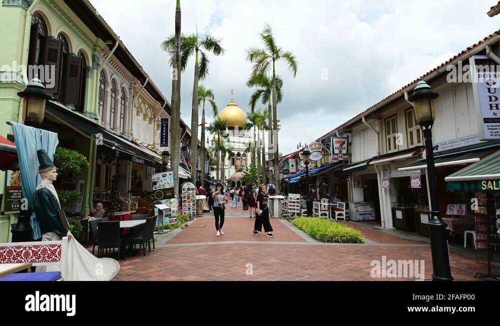 4K Hyper lapse of Bussorah Street lined with old shop houses and Masjid ...