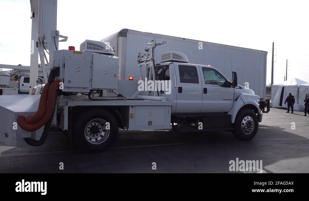 Customs vehicle x-rays truck scanning delivery truck at Super Bowl LIII ...