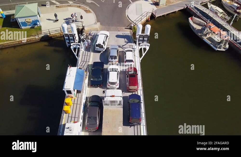 An aerial view of the Raymond Island ferry service unloading as cars ...