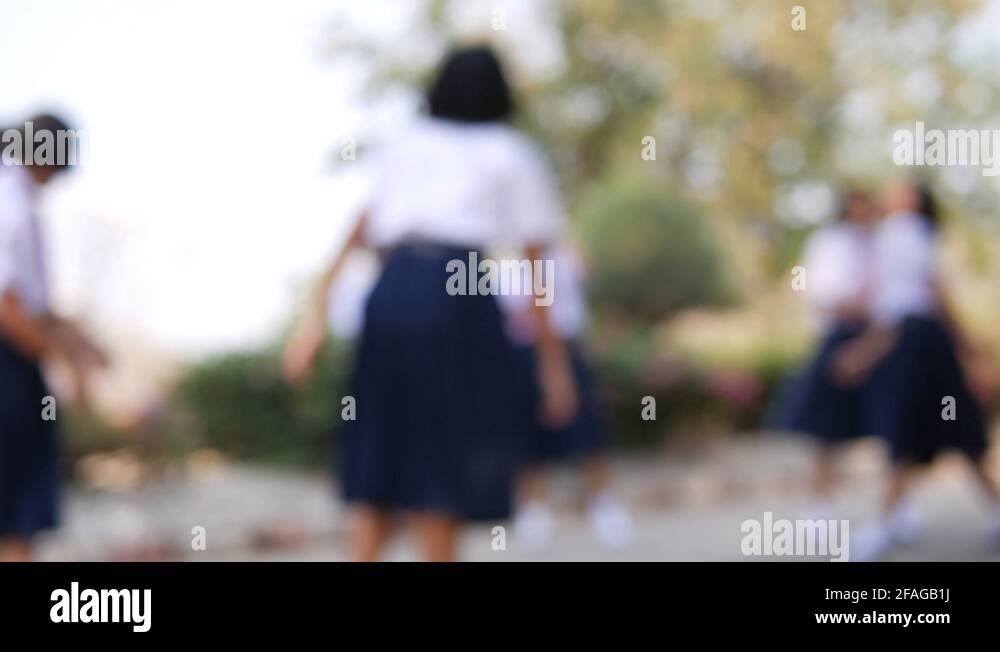 Blur background of Asian high school students in white uniform are ...