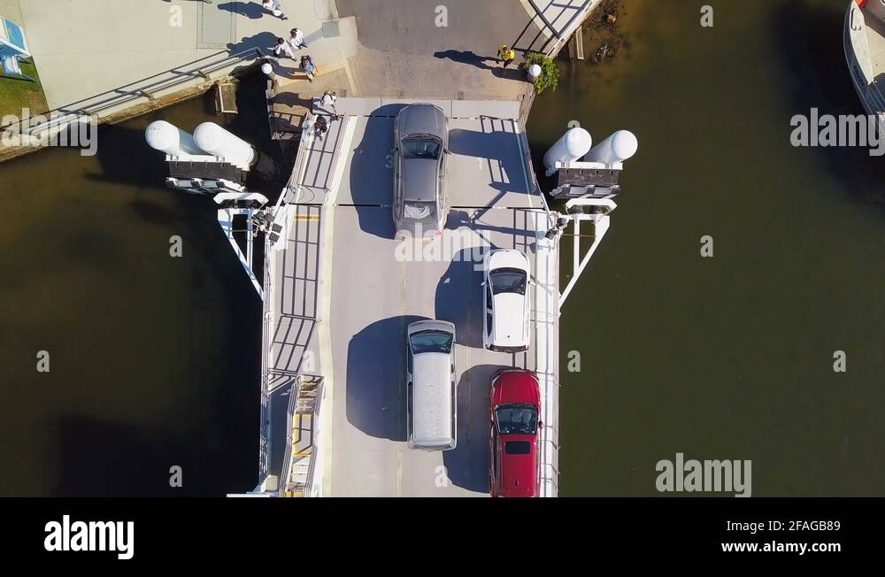 An aerial view of the Raymond Island ferry service unloading as cars ...