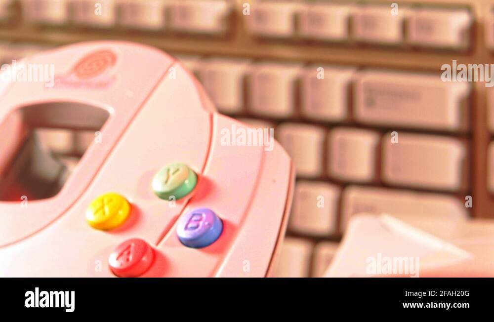 Sega Dreamcast Controller with Keyboard in Background SLIDE LEFT Stock ...