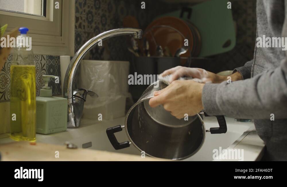 Hand washing pot Stock Videos & Footage - HD and 4K Video Clips - Alamy