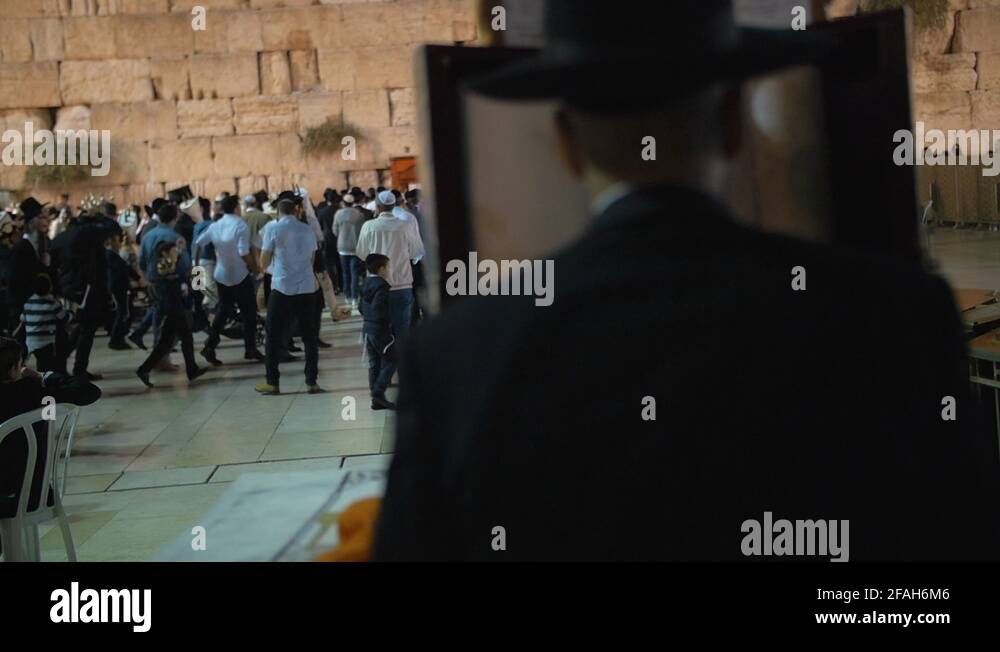 Jewish man reading the Torah at the Western wall of Jerusalem in Israel ...