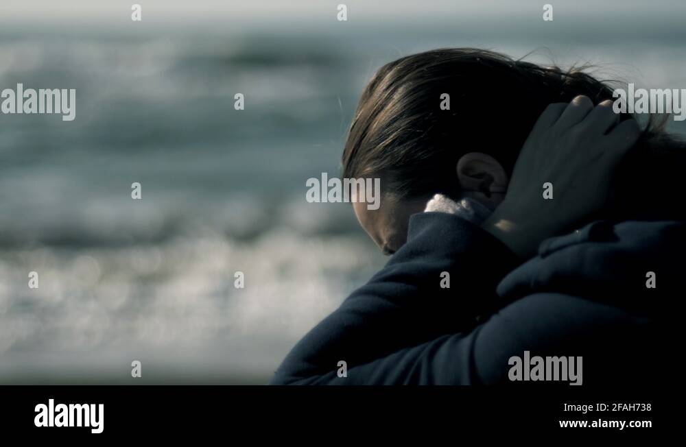 Sad woman crying feeling alone and desperate super slow motion Stock ...