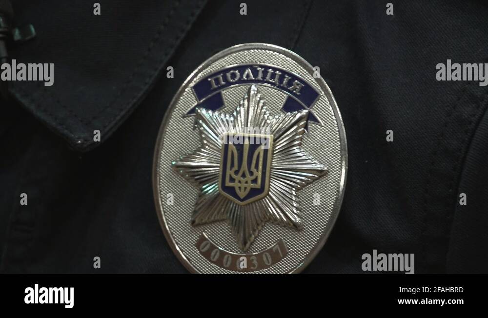 Ukrainian police badge on black man's uniform, close up Stock Video ...