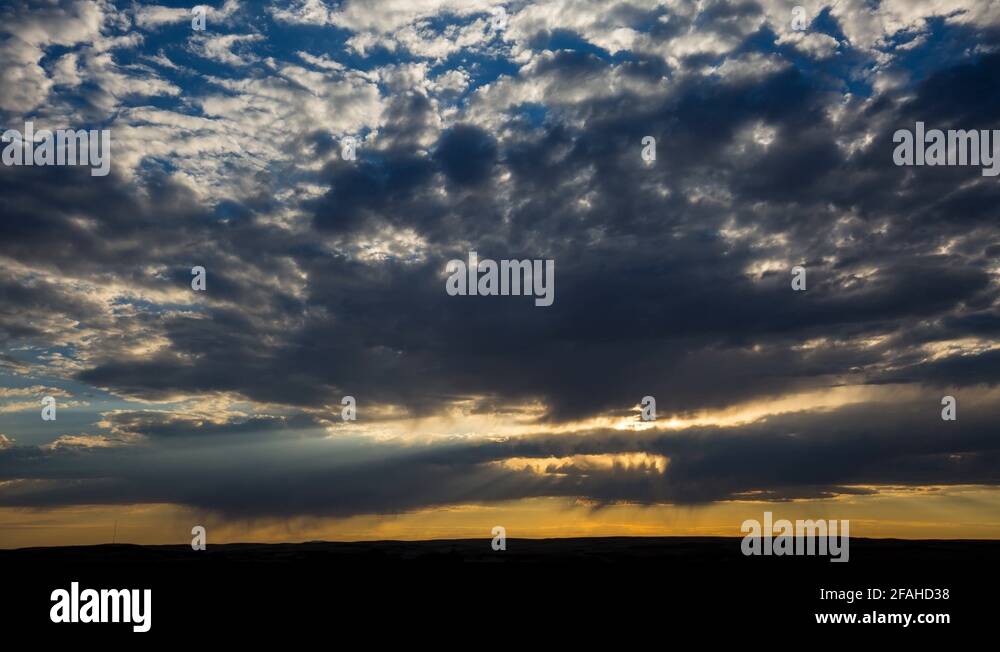 Cloudy sky with light rays Stock Videos & Footage - HD and 4K Video Clips - Alamy