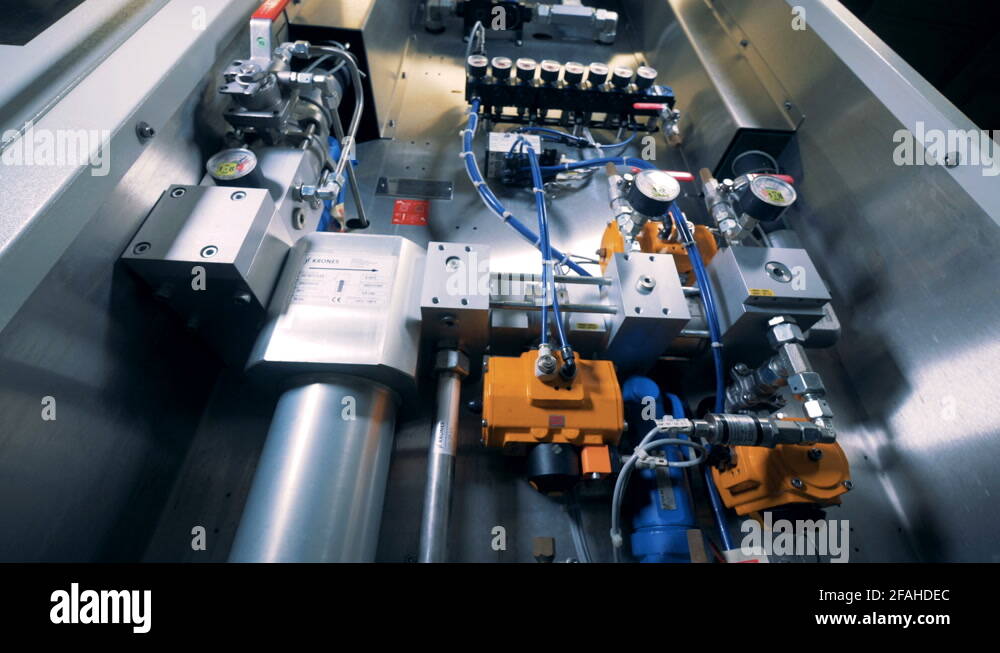 Inside view of a distillation machine with pressure gauges and tubes ...