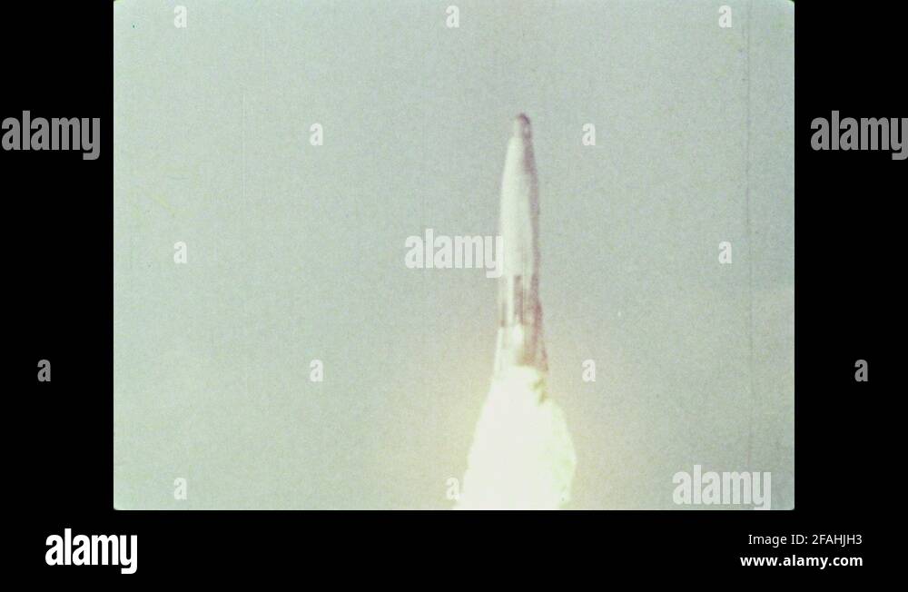 1960s: Rocket flies into sky. Pieces of rocket fall off Stock Video ...