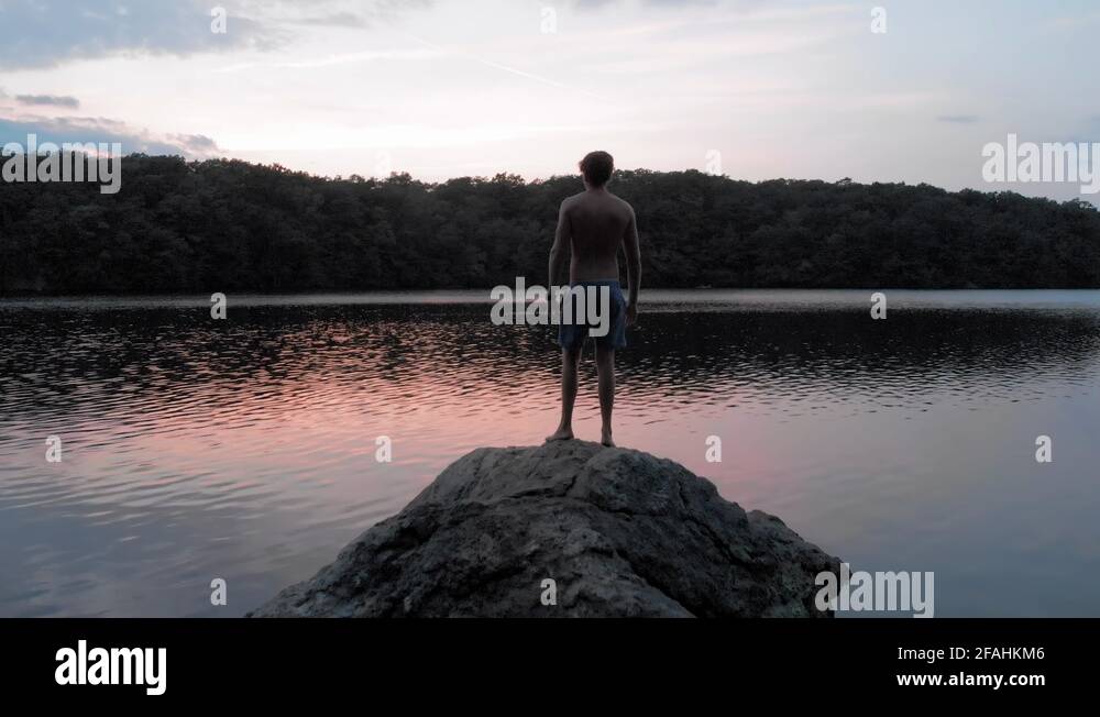 Man staring at lake Stock Videos & Footage - HD and 4K Video Clips - Alamy