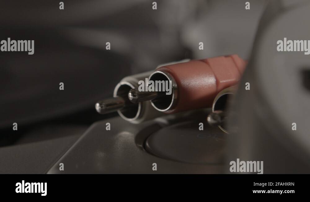 Vintage Playstation Cables and Console with Disc Spinning Inside SLIDE ...