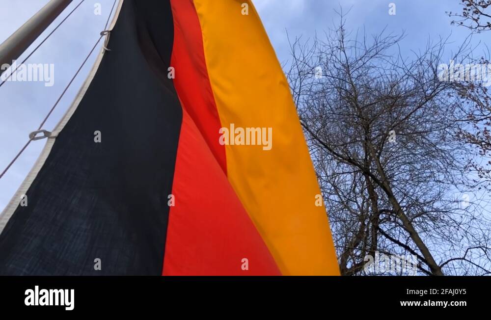 German Flag Flying in Wind - Slow Motion Stock Video Footage - Alamy