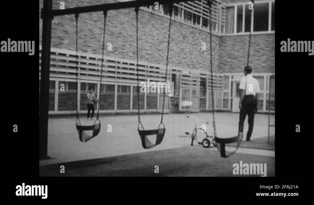 1960s: Teenager and boy play kickball Stock Video Footage - Alamy