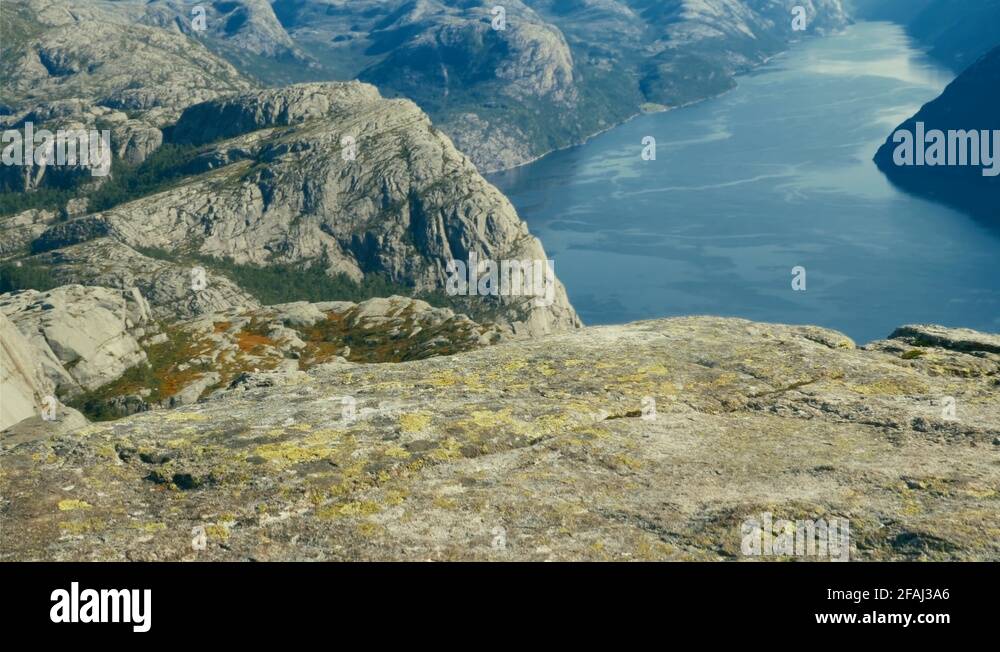 Hero pose atop of Pulpit Rock, zoom pull, people posing on the edge of ...