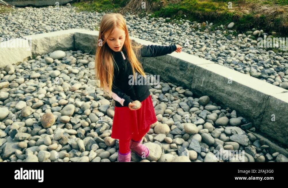 Little girl tries keep balance Stock Videos & Footage - HD and 4K Video ...