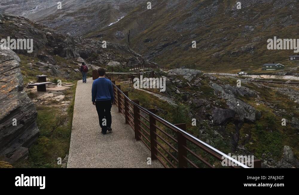 Tourists walls on the pathways of Troll's ladder, Trollstigen in Norway ...