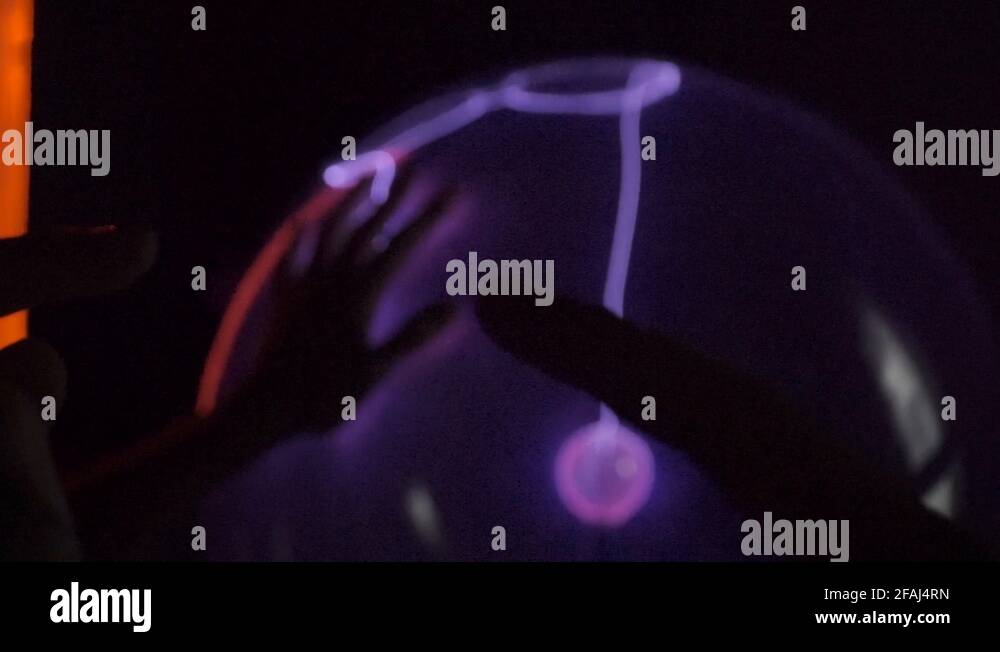 Electric spark between two people fingers Stock Video Footage - Alamy