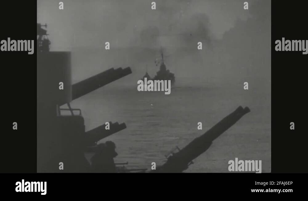 Scenes of war in sea, soldiers disembark in to mechanized landing craft ...
