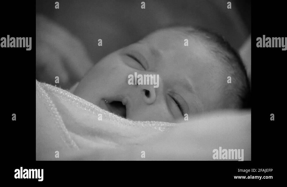 Adult Male Hand Caressing The Face Of A Baby Stock Video Footage - Alamy