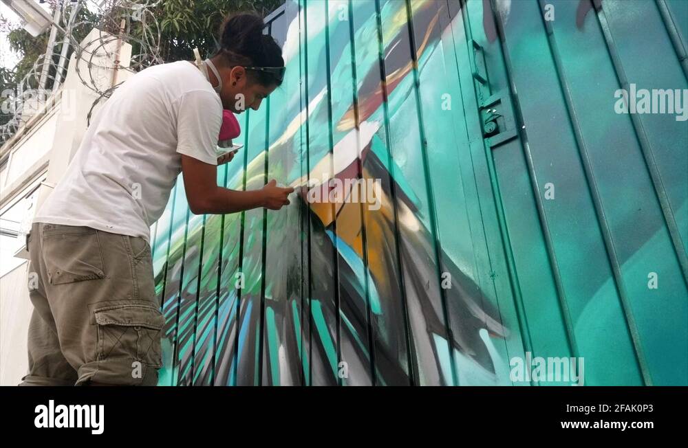 Graffiti artist in downtown Stock Videos & Footage - HD and 4K Video ...