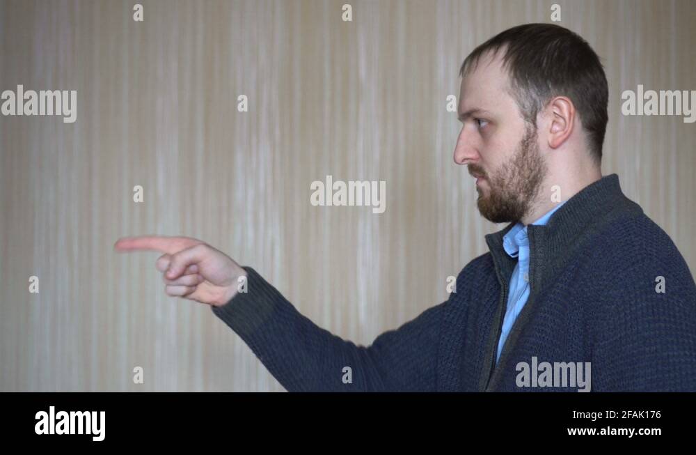 Man points finger Stock Videos & Footage - HD and 4K Video Clips - Alamy
