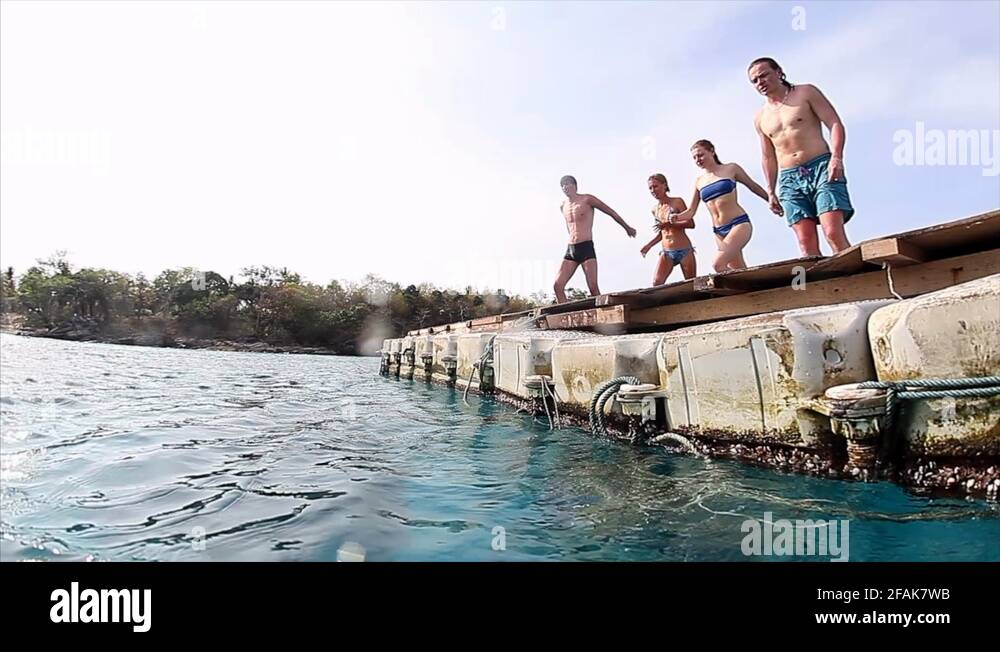 Group of people jumping into sea Stock Videos & Footage - HD and 4K ...