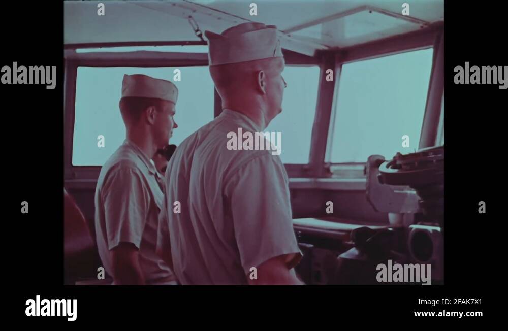 Lt. R.P.Connell and Ensign Bond observe the sea from USS Maddox - 1964 ...