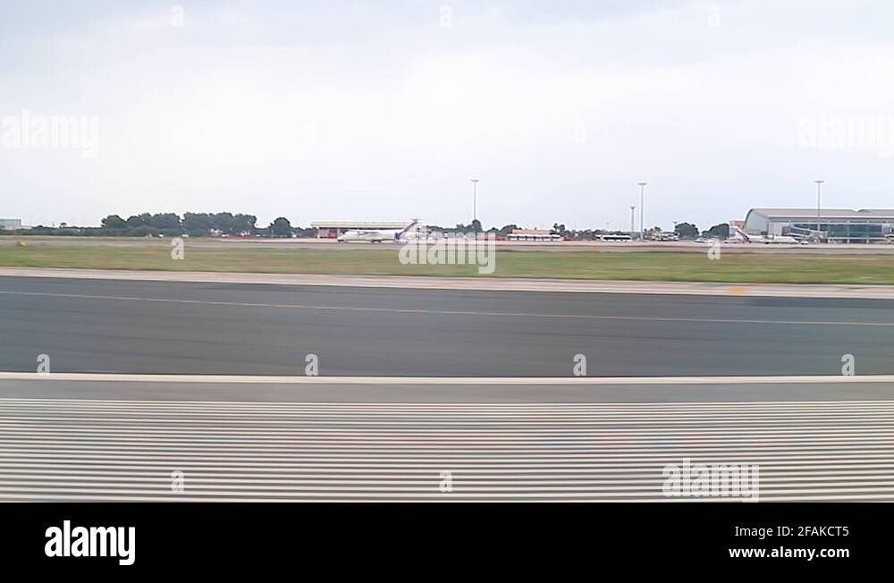takeoff from inside plane, view through the window to the airport Stock ...