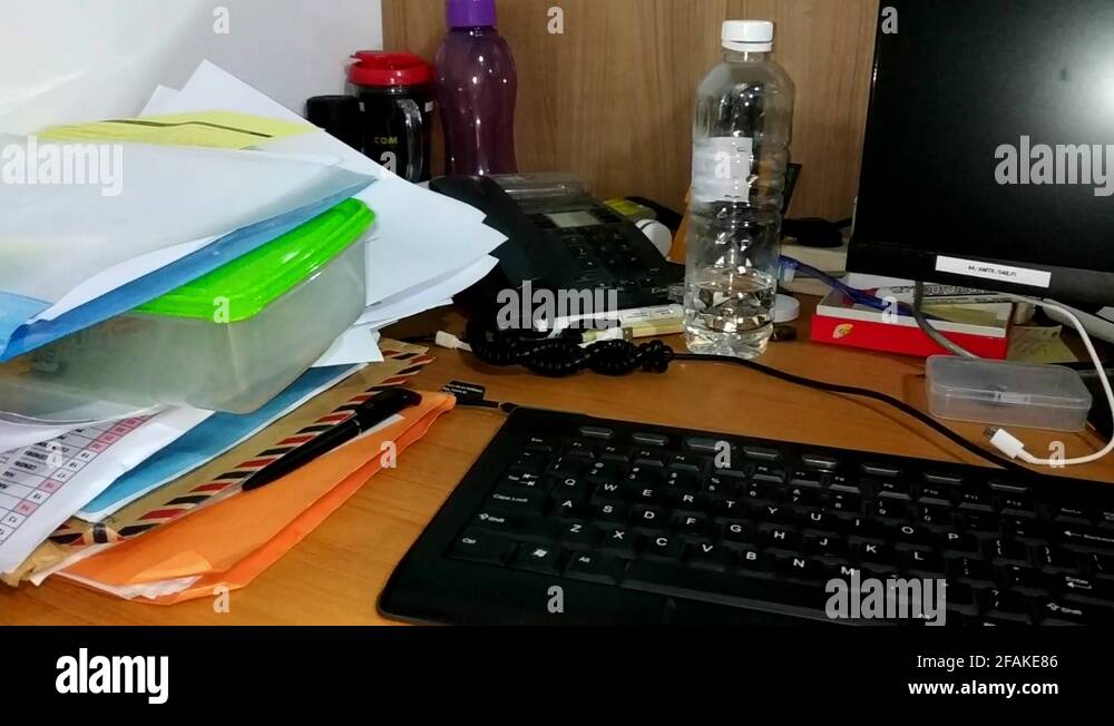 Messy desk Stock Videos & Footage - HD and 4K Video Clips - Alamy
