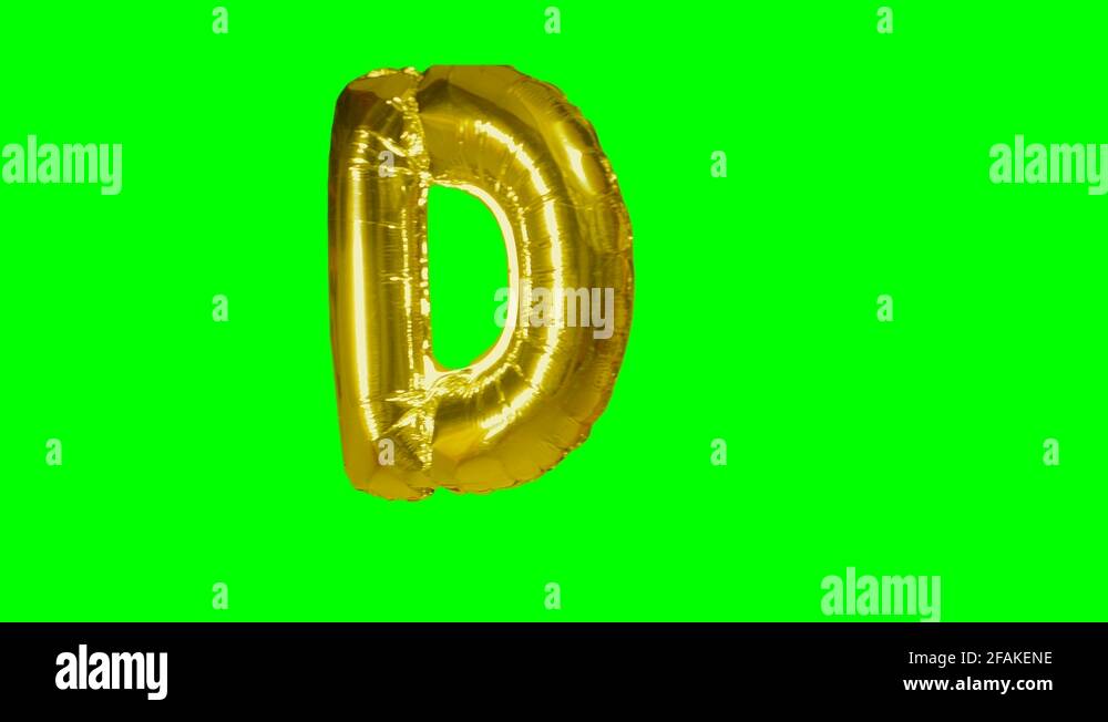 Big Letter D from alphabet helium gold balloon floating on green screen ...