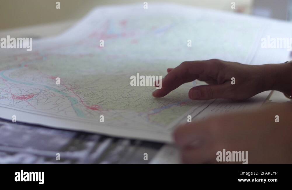 Checking maps Stock Videos & Footage - HD and 4K Video Clips - Alamy