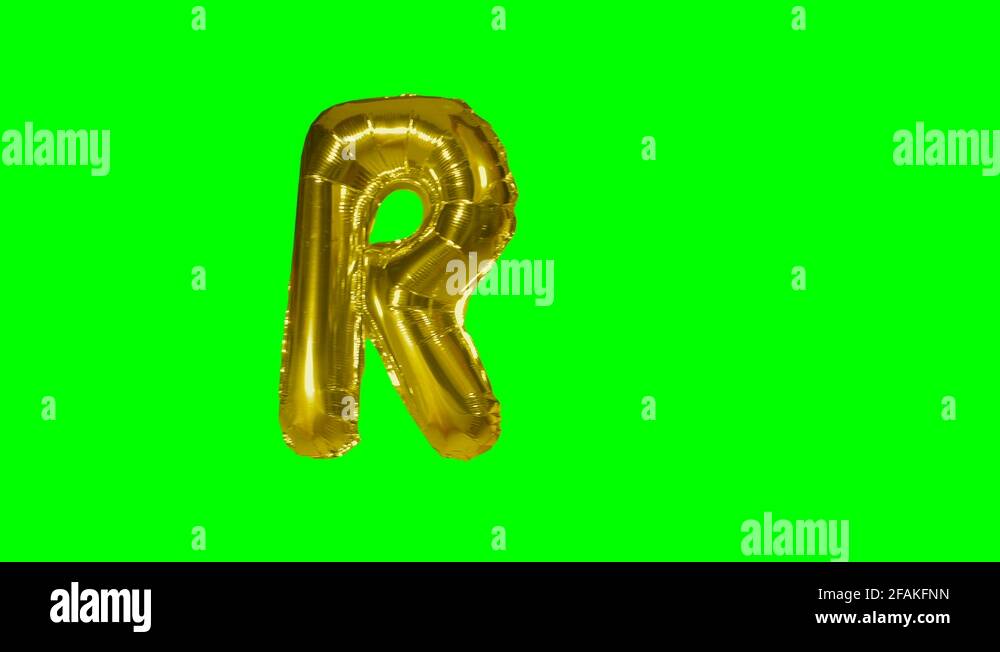 Big Letter R from alphabet helium gold balloon floating on green screen ...