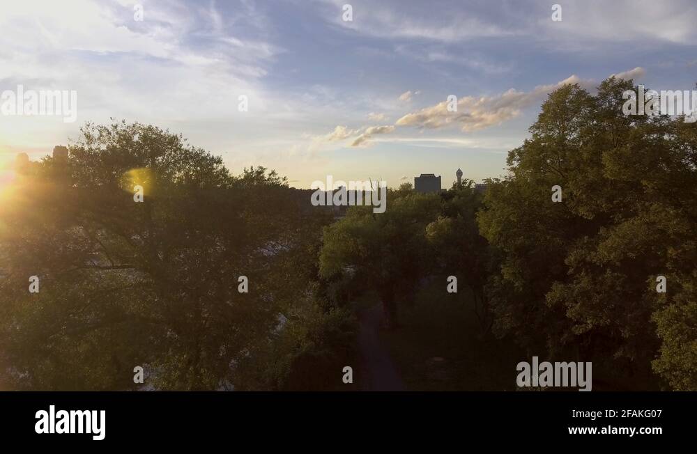 Niagara Falls river view, revealed over tree tops with a Canadian ...