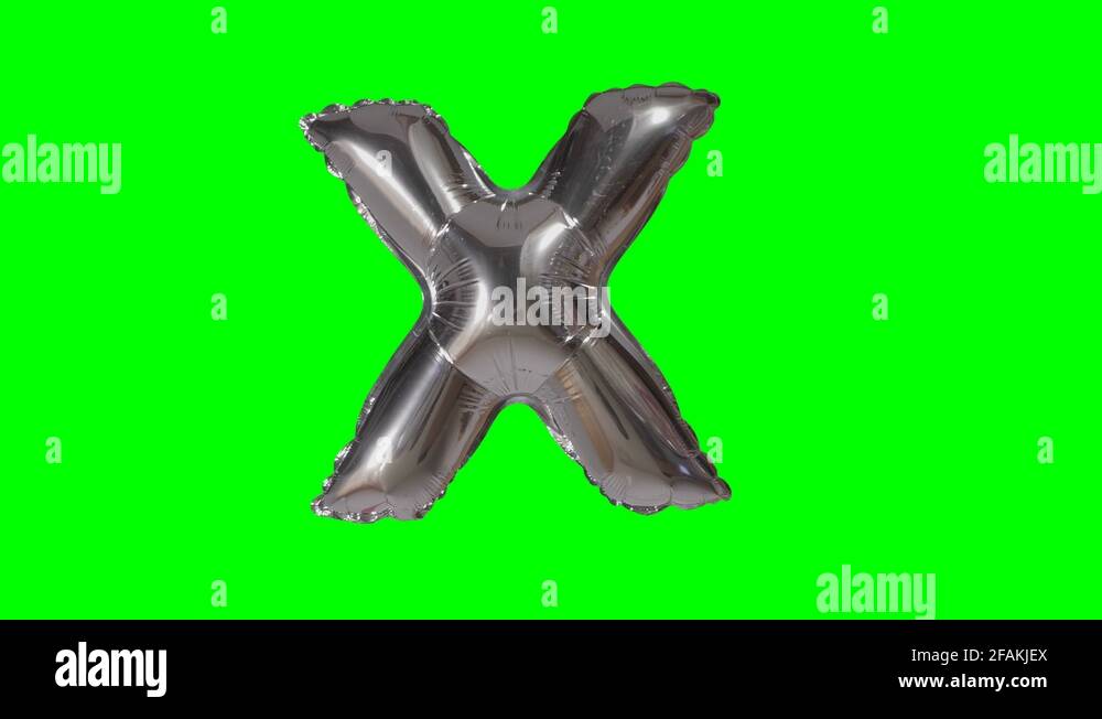 Big Letter X from alphabet helium silver balloon floating on green ...