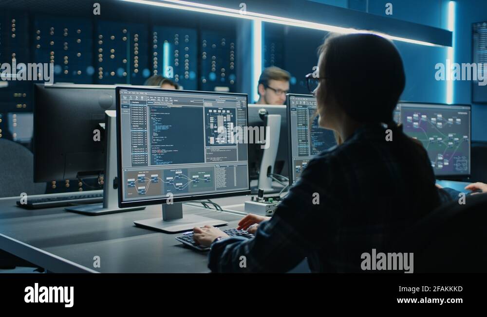Smart Female IT Programer Working on Desktop Computer in Data Center System Stock Video Footage ...