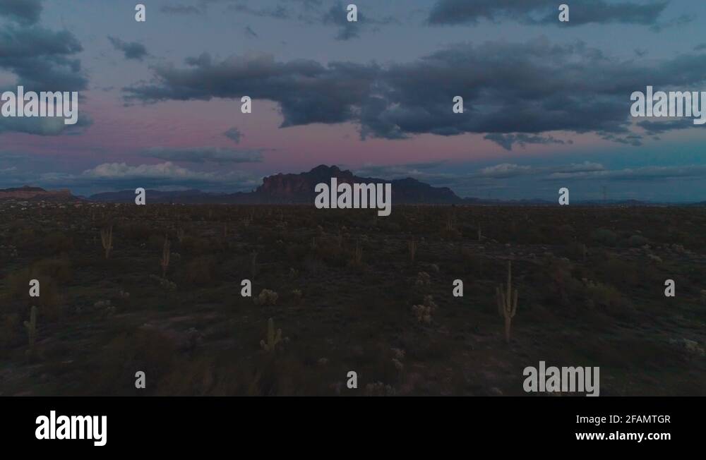 Purple Sunset On Desert Mountain in Sonoran Desert with Foreboding ...
