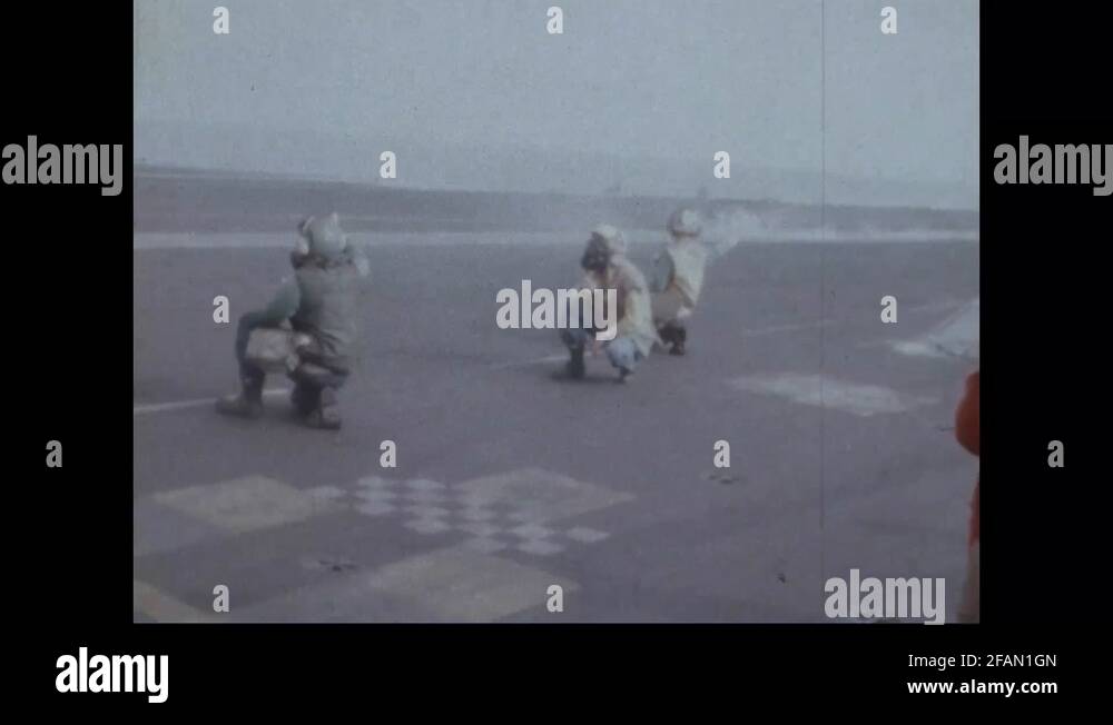 Aircraft marshaled signal aircraft to take off from flight deck - 1983 ...