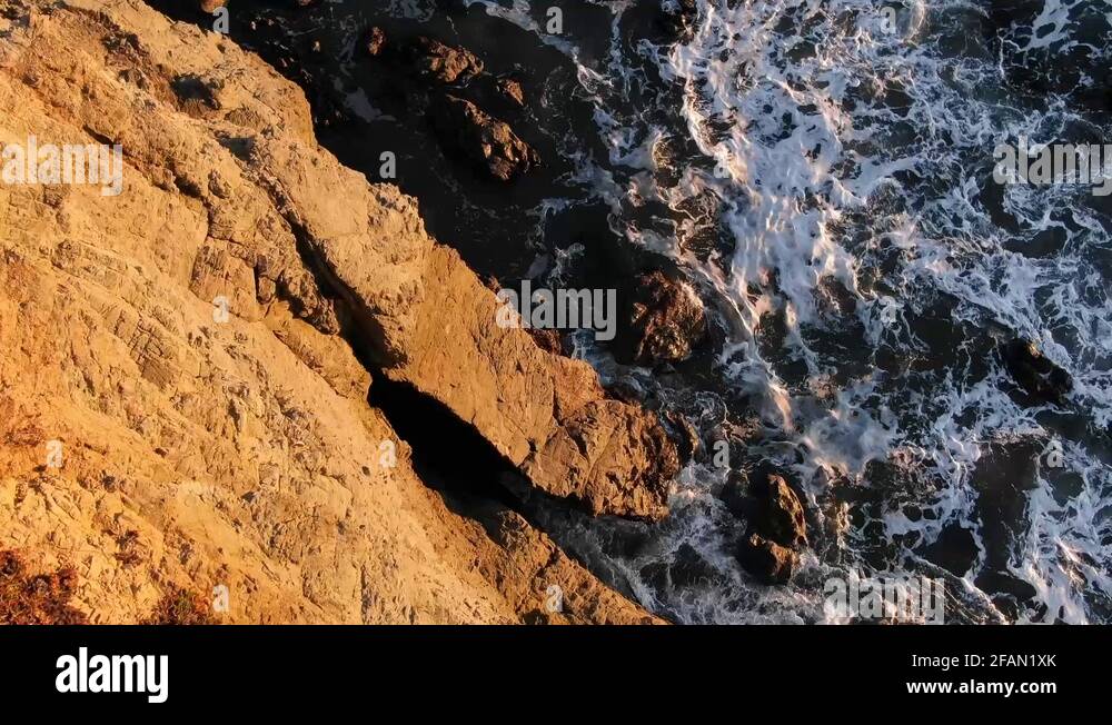 Surf breaking on rocks Stock Videos & Footage - HD and 4K Video Clips ...