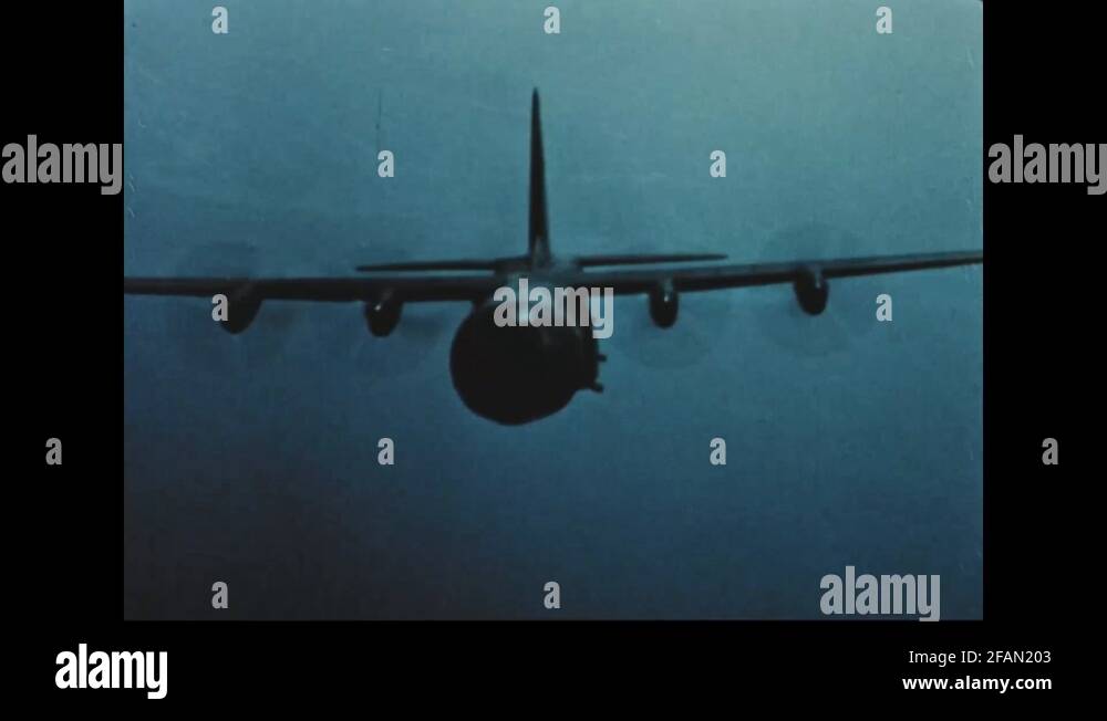 Missile being launch from AC-130 gunship during airborne fire testing ...