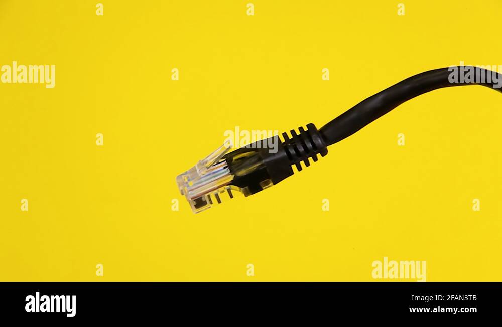 Cutting a black network cable with sharp scissors (the head flies away ...